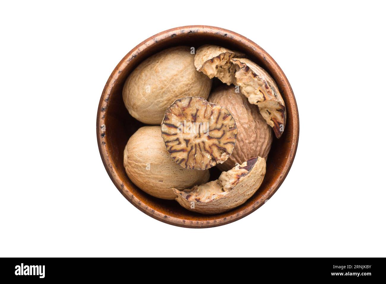 Whole nutmeg in bowl hi-res stock photography and images - Alamy