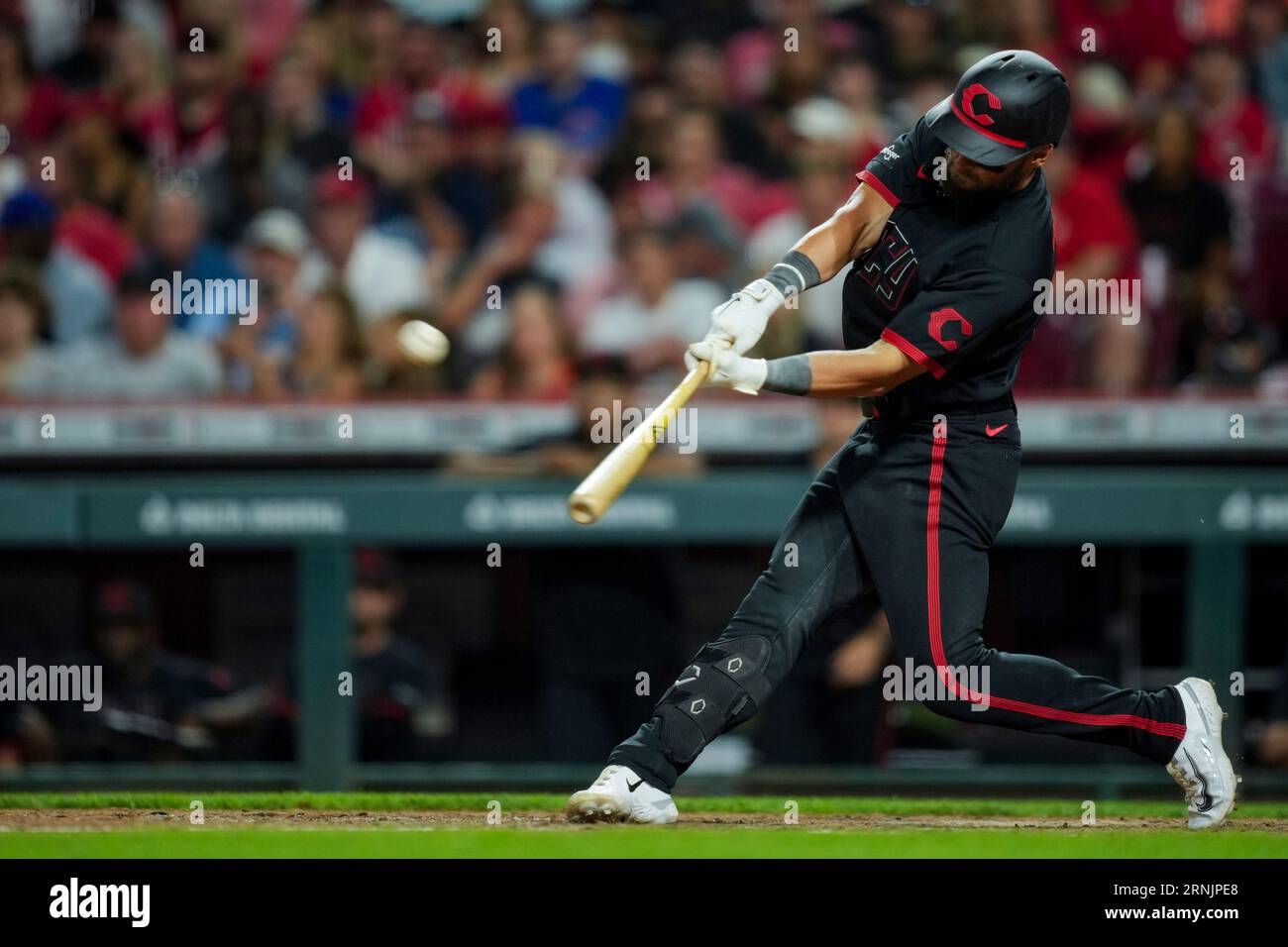 Cincinnati Reds' Nick Martini hits a solo home run during the ninth ...