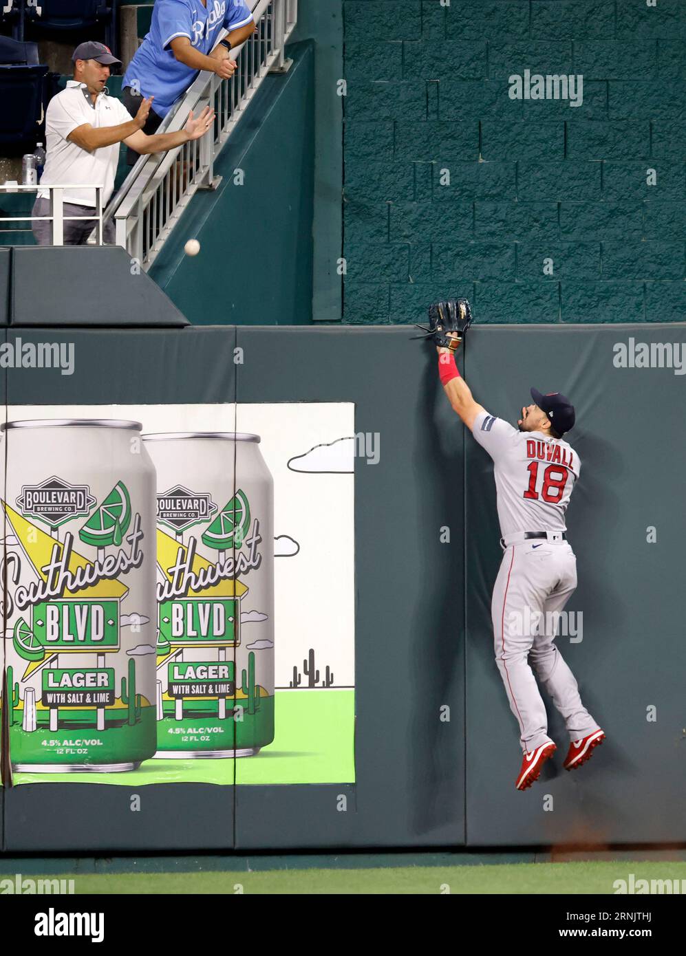 Boston Red Sox center fielder Adam Duvall is unable to reach a home run ...