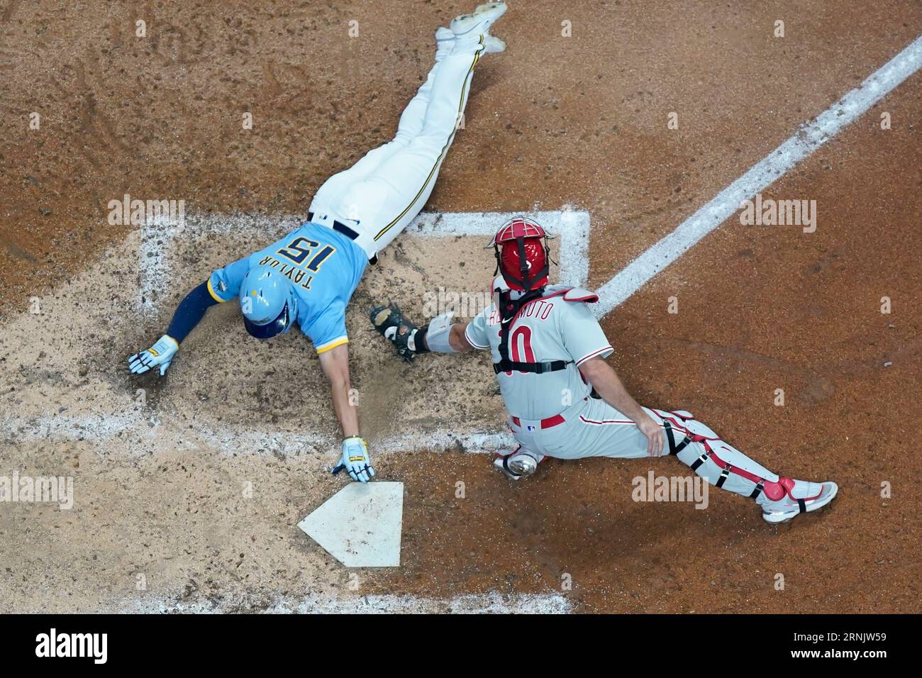 Milwaukee Brewers' Tyrone Taylor scores past Philadelphia Phillies ...