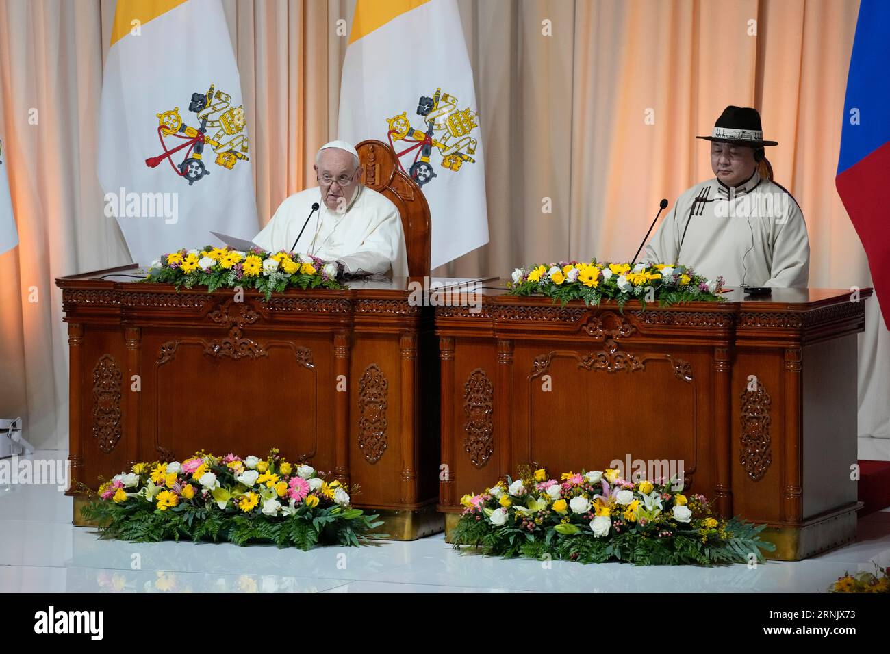 Mongolian President Ukhnaagiin Khurelsukh, right, and Pope Francis ...