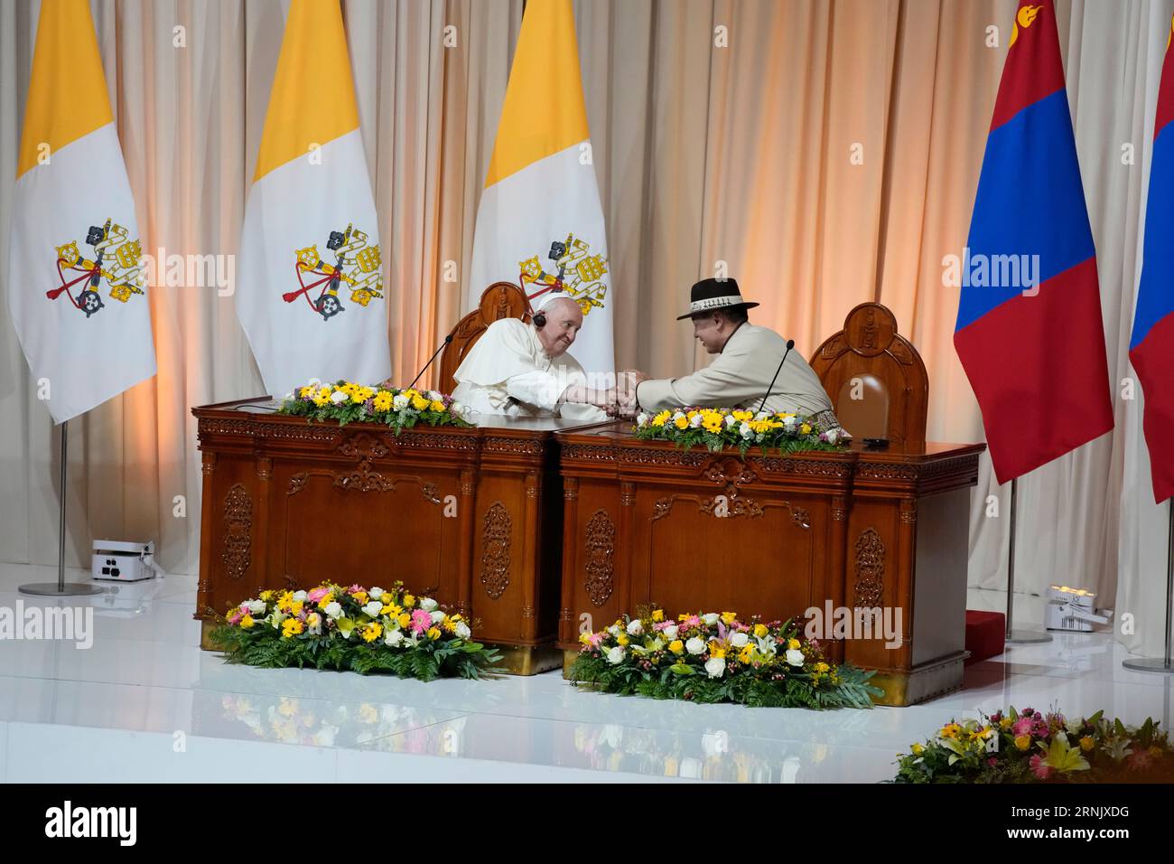 Mongolian President Ukhnaagiin Khurelsukh, right, and Pope Francis ...