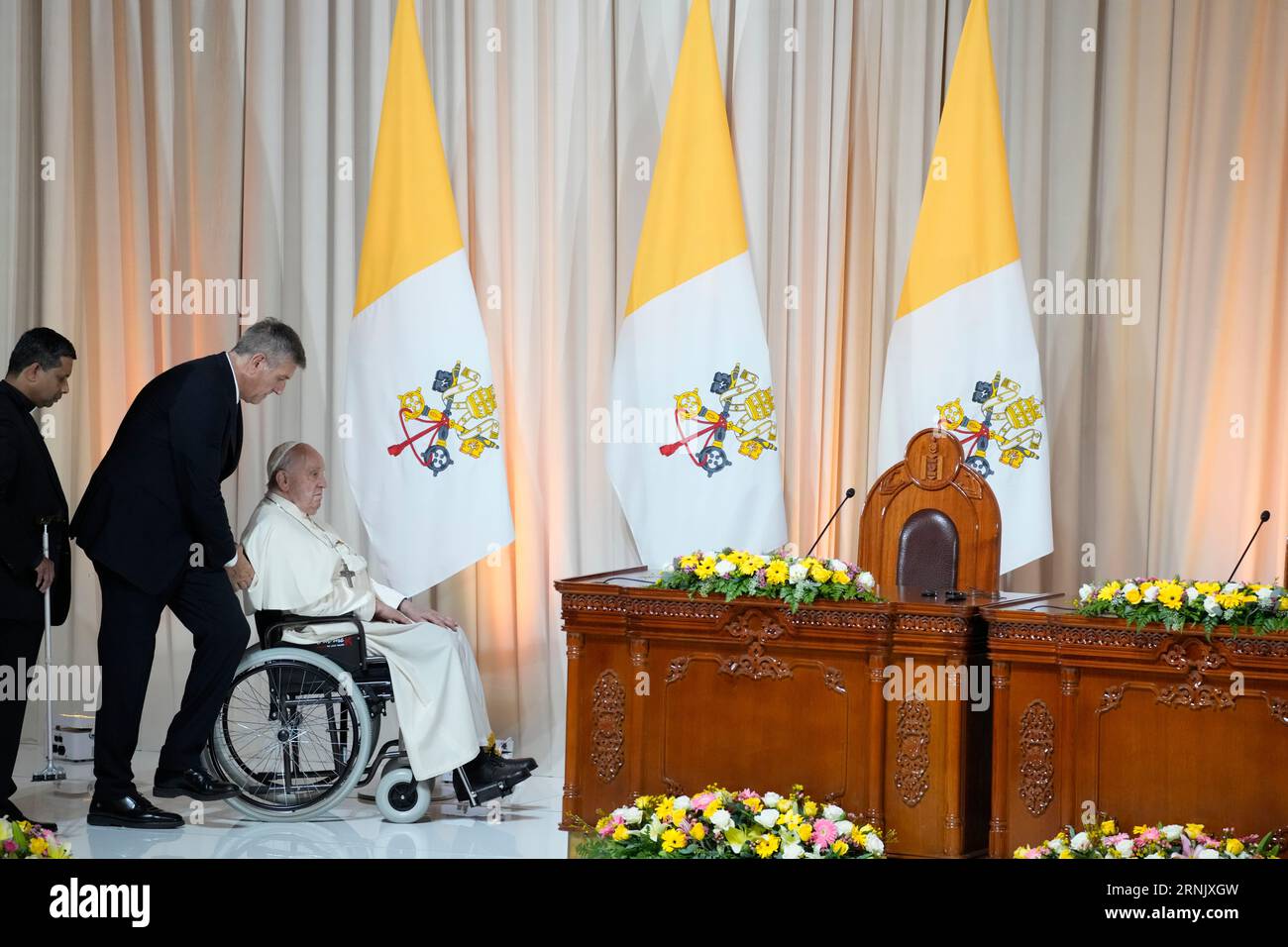 Pope Francis arrives, Saturday, Sept. 2, 2023, at a meeting with ...