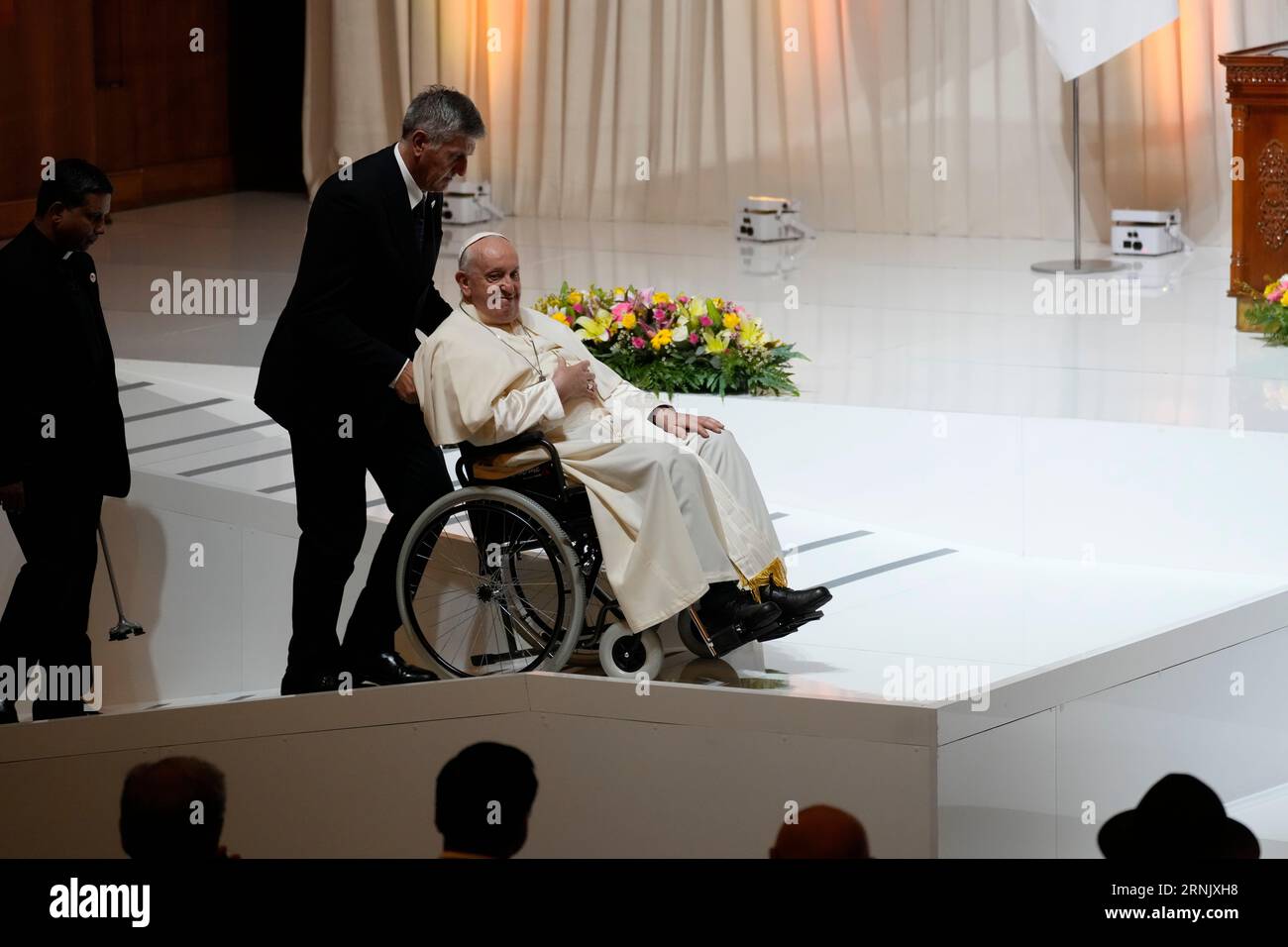 Pope Francis arrives, Saturday, Sept. 2, 2023, at a meeting with ...