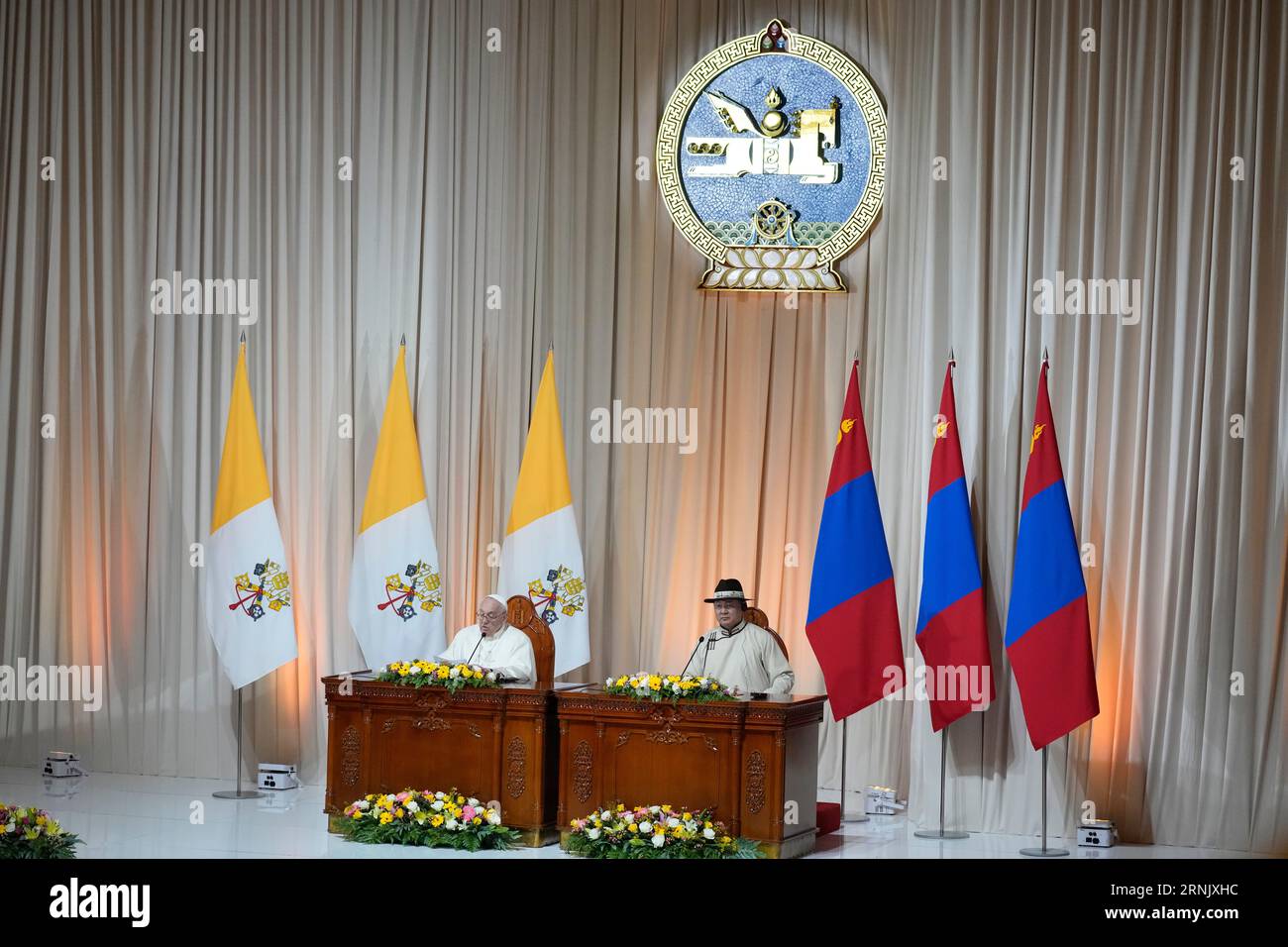 Mongolian President Ukhnaagiin Khurelsukh, right, and Pope Francis ...