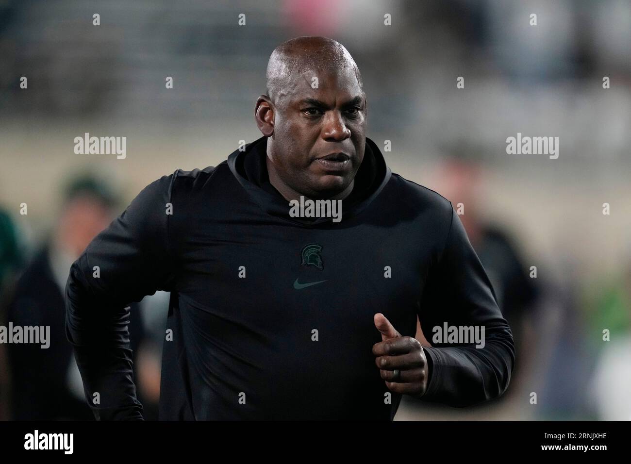 Michigan State head coach Mel Tucker runs to the locker room after the ...