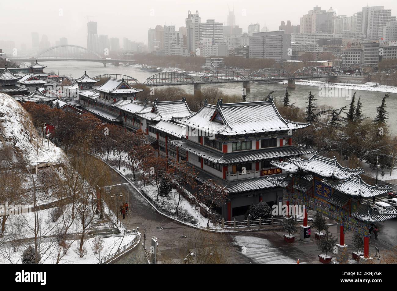 Photo taken on Feb. 21, 2017 shows snow scenery in Lanzhou, capital of ...