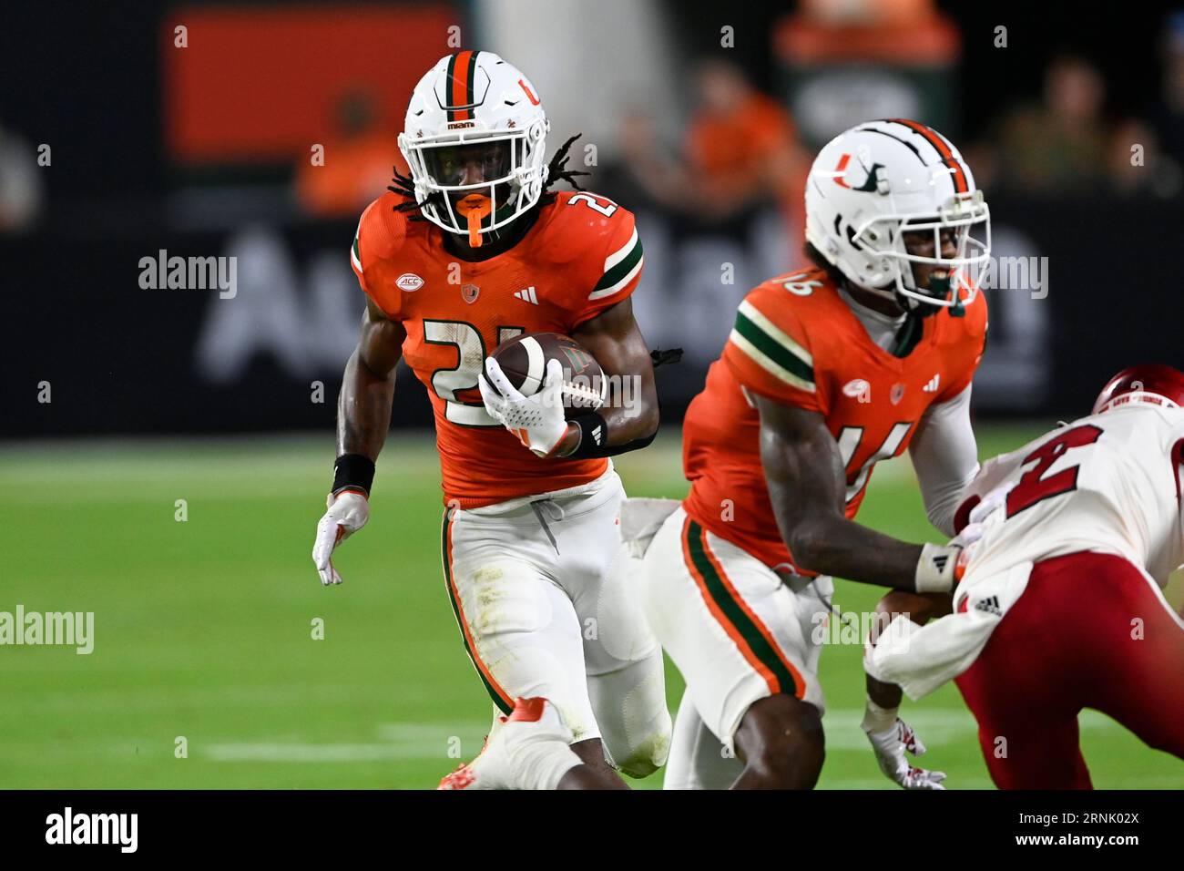 Miami's running back Henry Parrish, Jr. (21) runs with the ball during ...