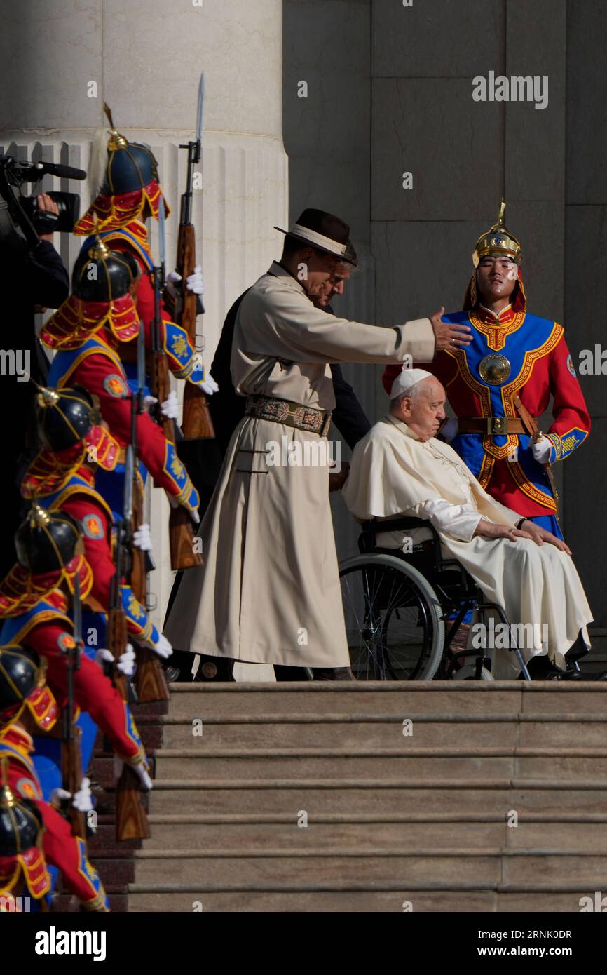 Mongolian President Ukhnaagiin Khurelsukh, left, welcomes Pope Francis ...