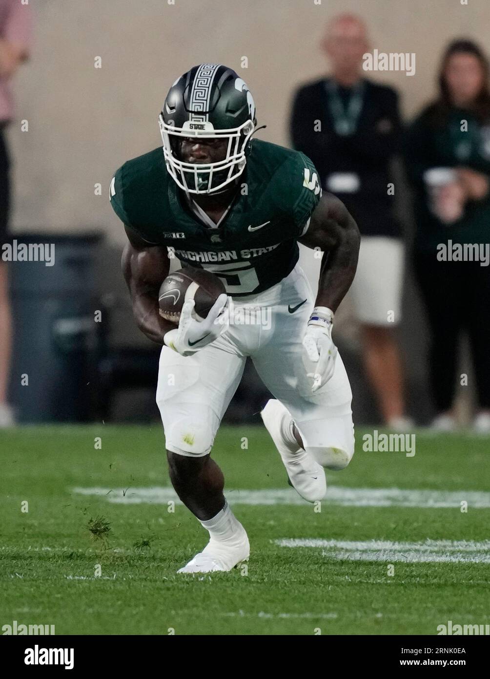 Michigan State running back Nathan Carter (5) rushes during the first ...