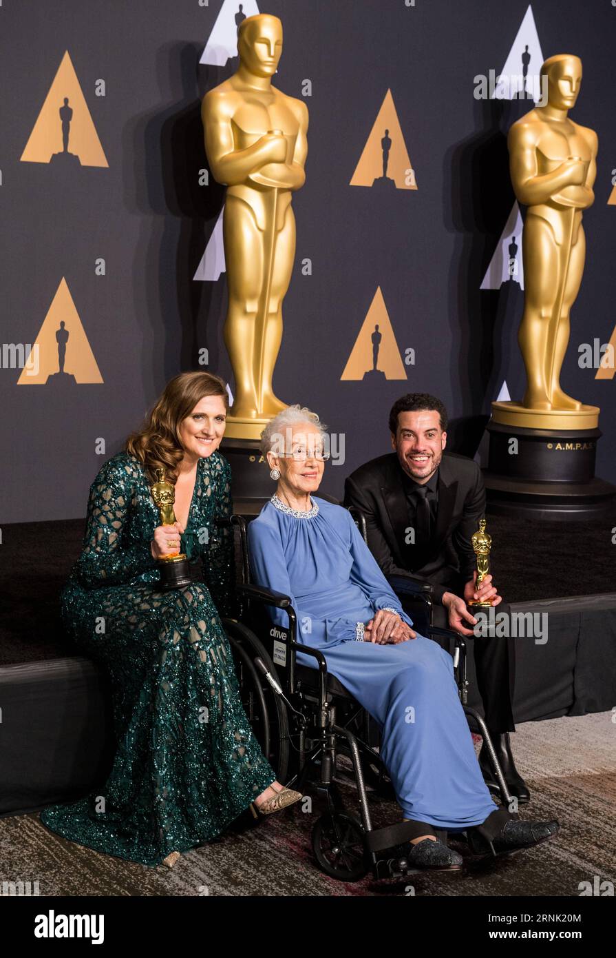 Director Ezra Edelman (R) and producer Caroline Waterlow (L) pose after ...