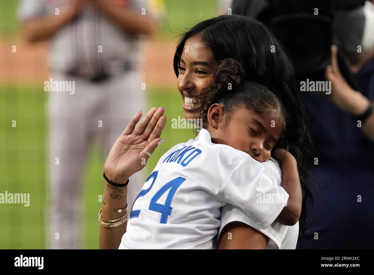Natalia Bryant, daughter of Kobe Bryant, holds her sister Capri Bryant ...
