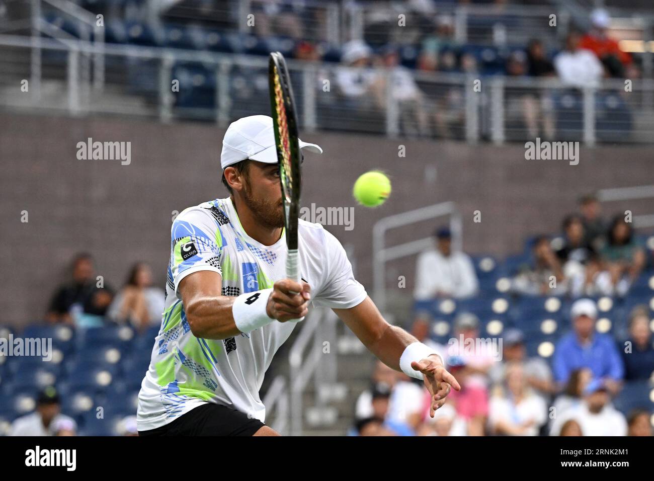 Benjamin Bonzi in action during a men's singles match at the 2023 US ...
