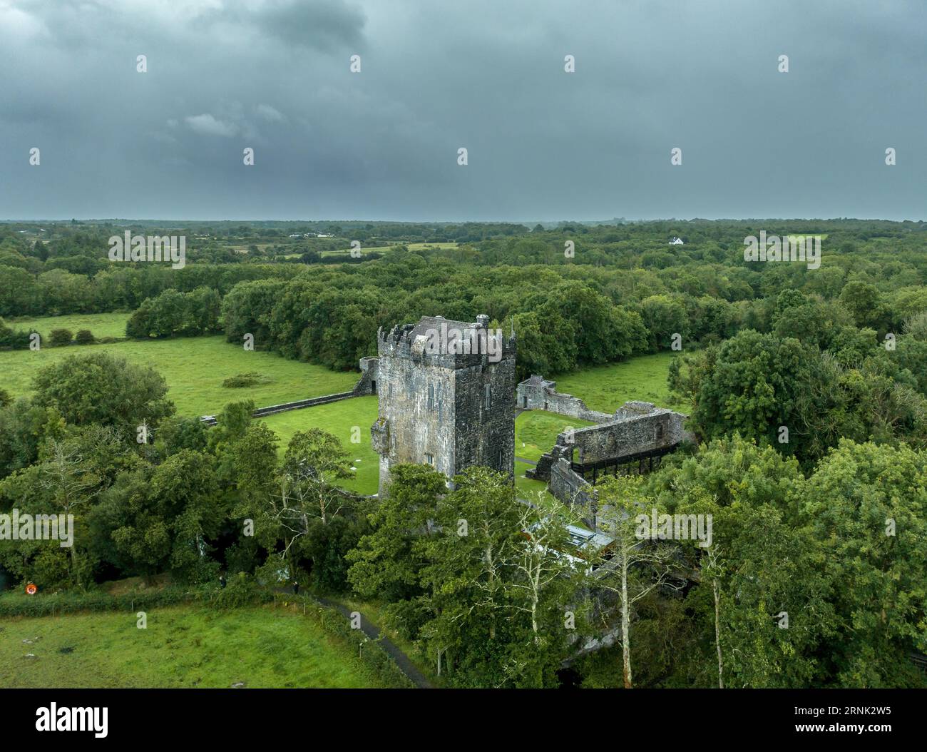 Aerial view of Aughnanure castle in Ireland with large multi ...