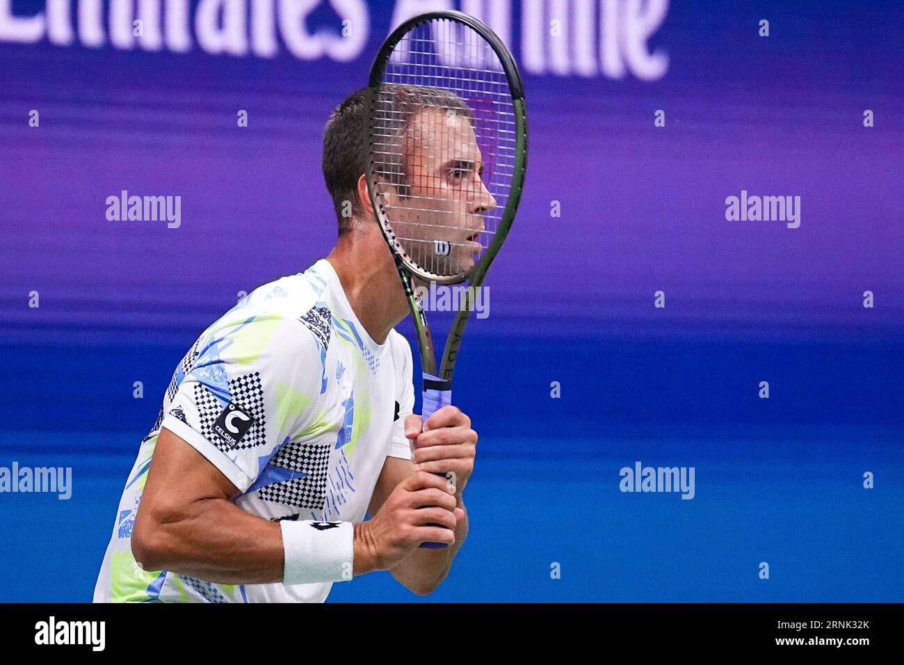 Laslo Djere in action during a men's singles match at the 2023 US Open ...