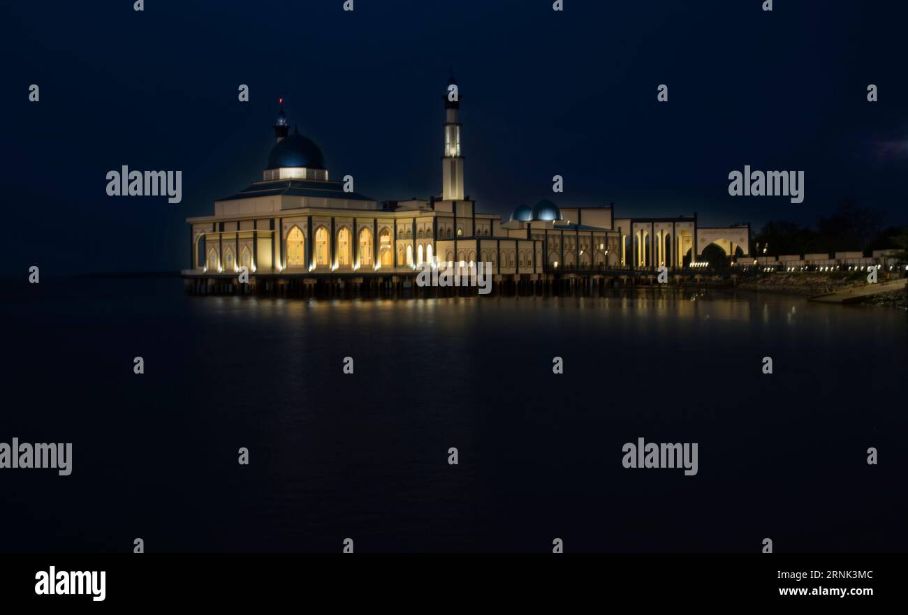 Outdoor scene of the famous architectural floating Tuminah Mosque ...