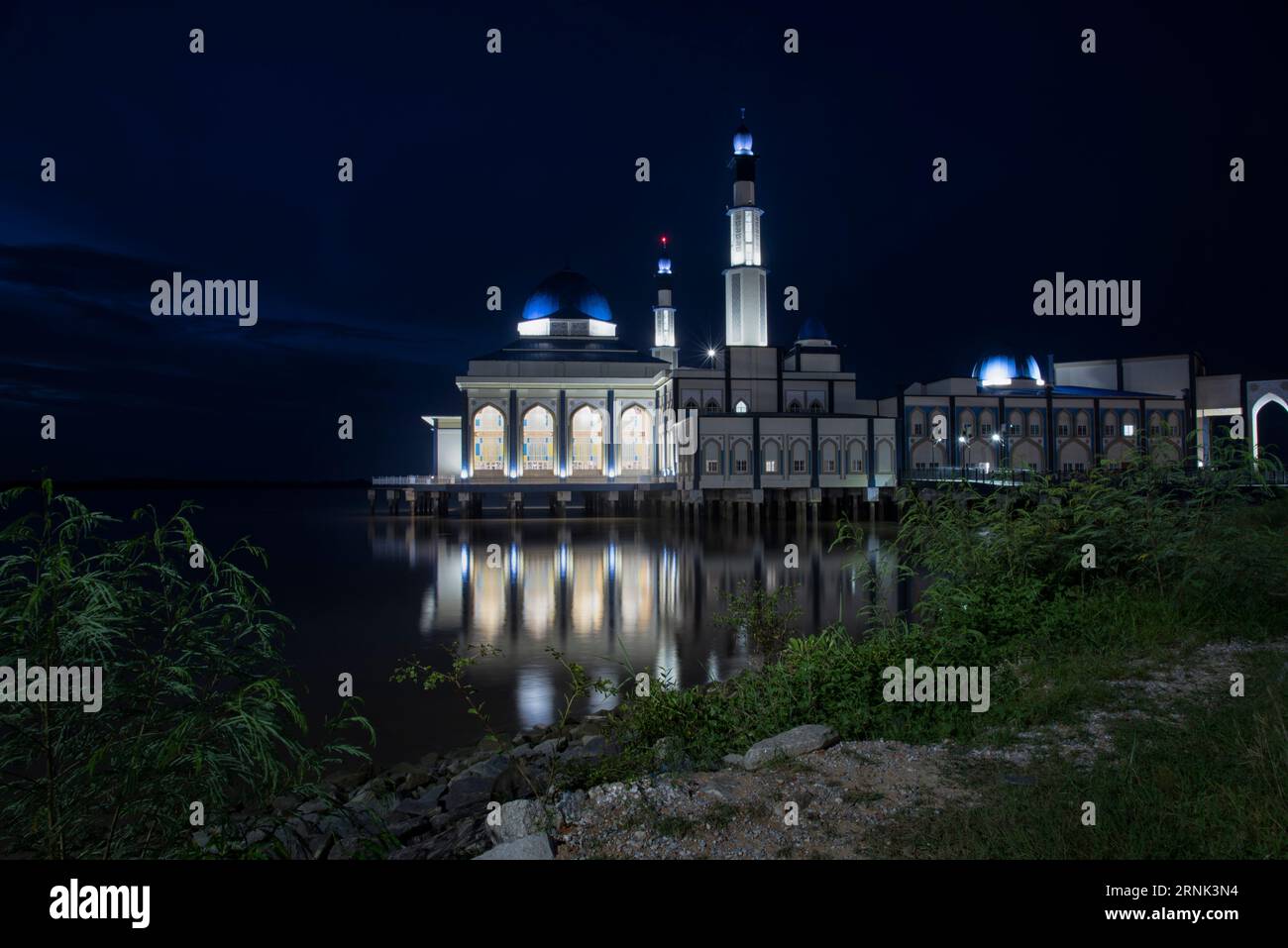 Outdoor scene of the famous architectural floating Tuminah Mosque ...