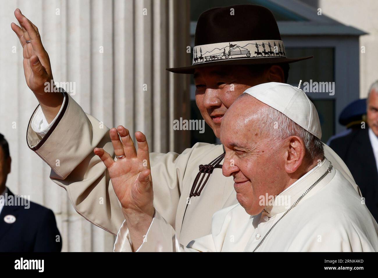 Mongolian President Ukhnaagiin Khurelsukh, left, wave with Pope Francis ...