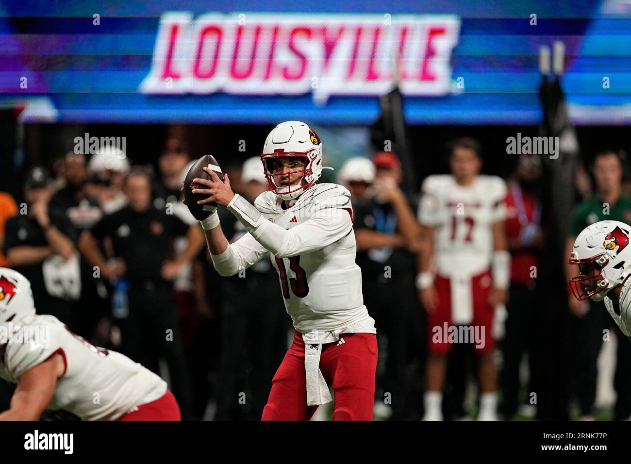 Louisville quarterback Jack Plummer (13) works in the pocket against ...