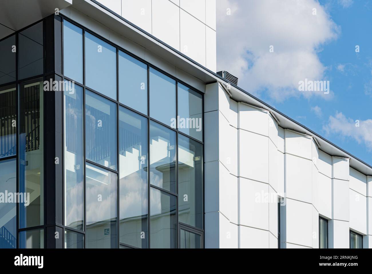 New building facade in housing complex. Modern style in architecture ...