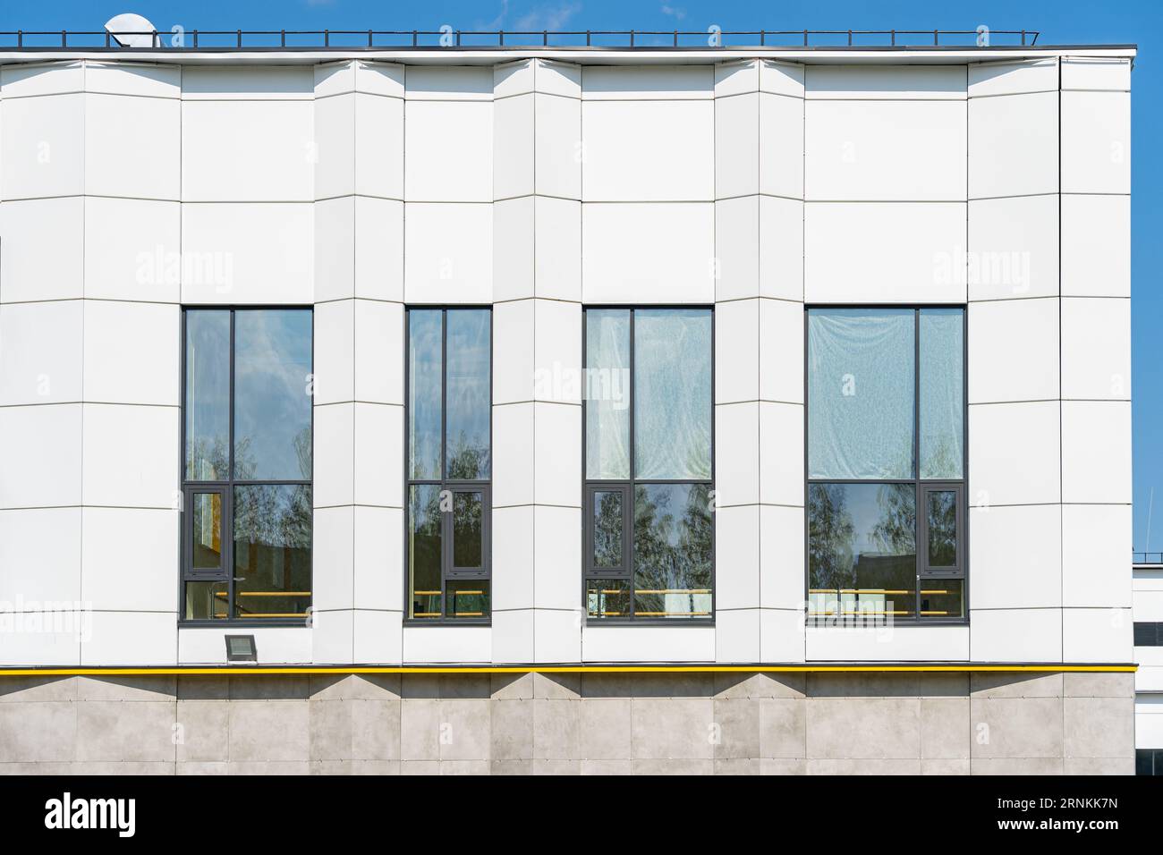 New building facade in housing complex. Modern style in architecture ...