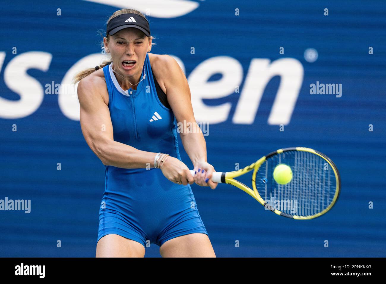 Caroline Wozniacki of Denmark returns ball during 3rd round against ...