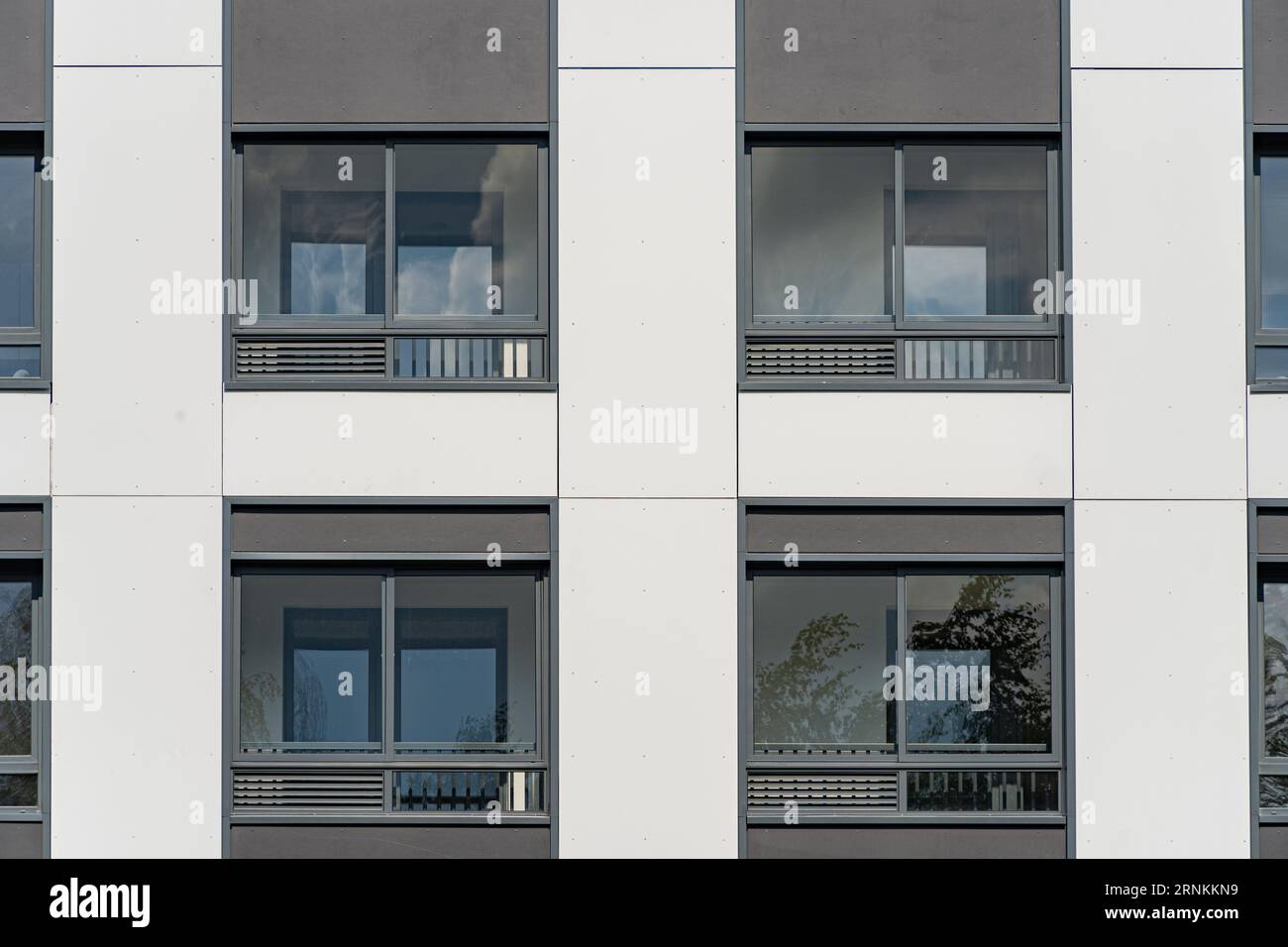 New building facade in housing complex. Modern style in architecture ...