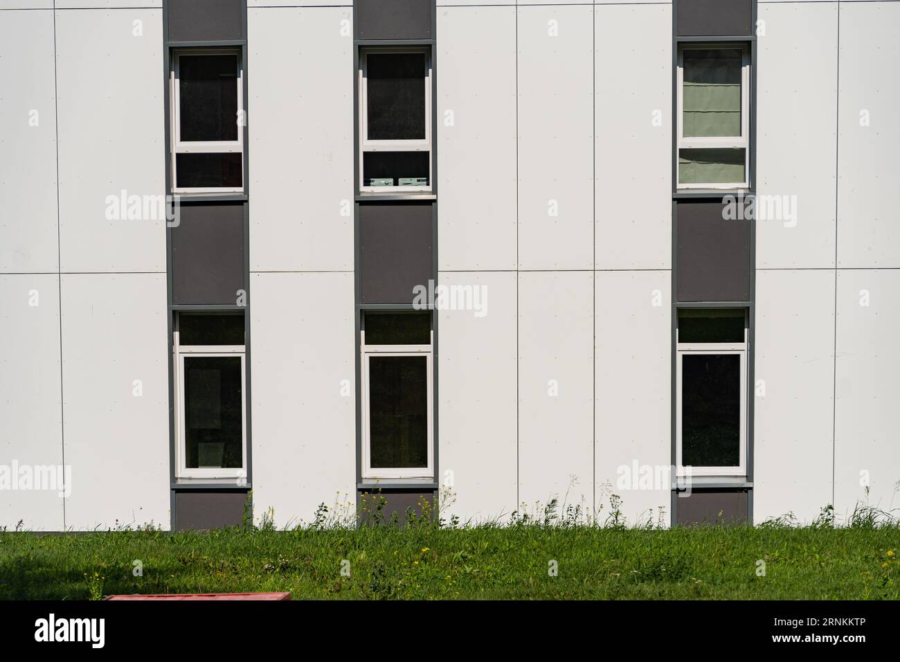 New building facade in housing complex. Modern style in architecture ...