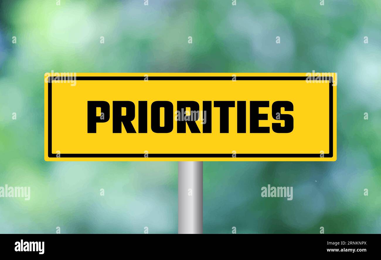 Priorities road sign on blur background Stock Photo - Alamy