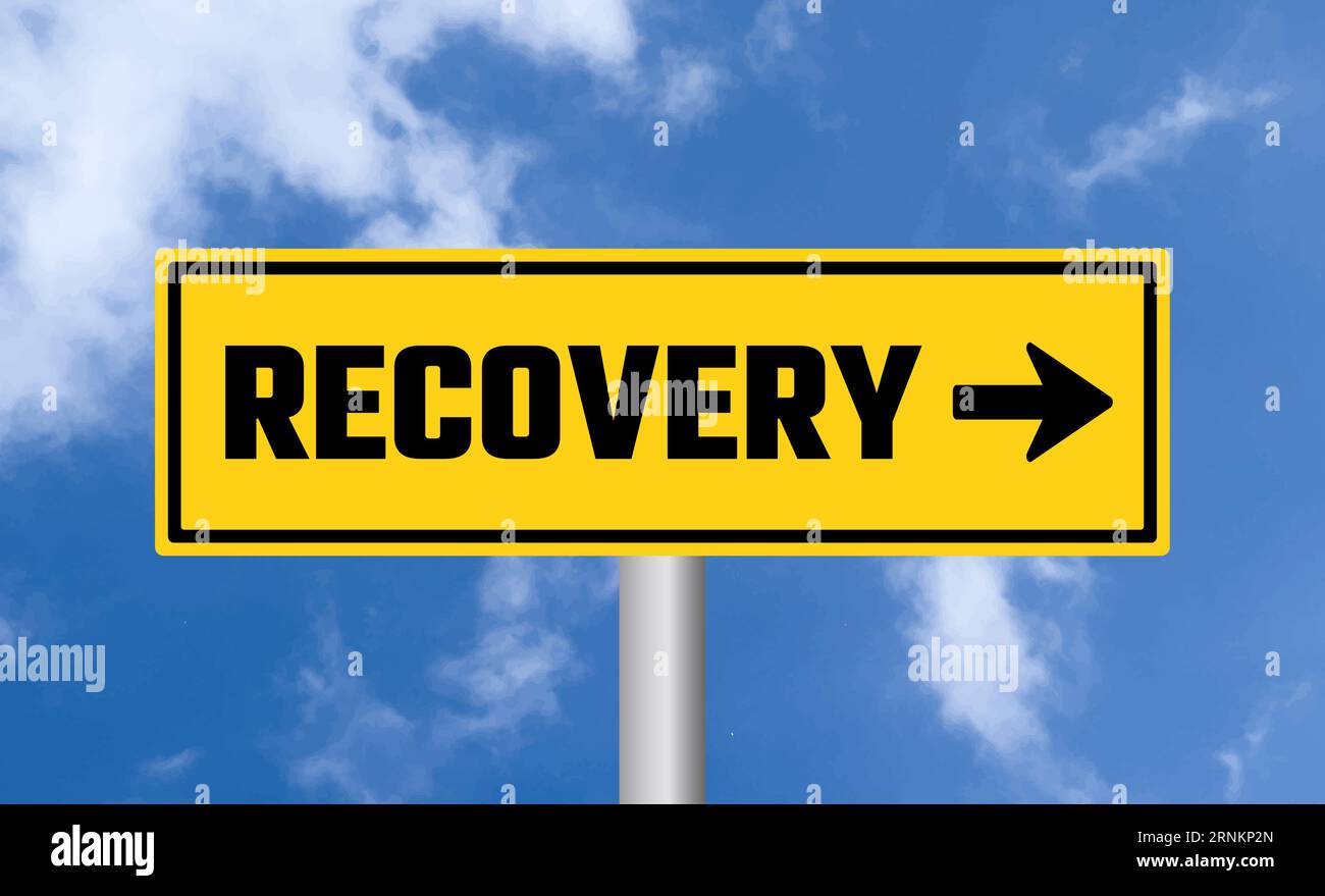 Recovery road sign on cloudy sky background Stock Photo - Alamy