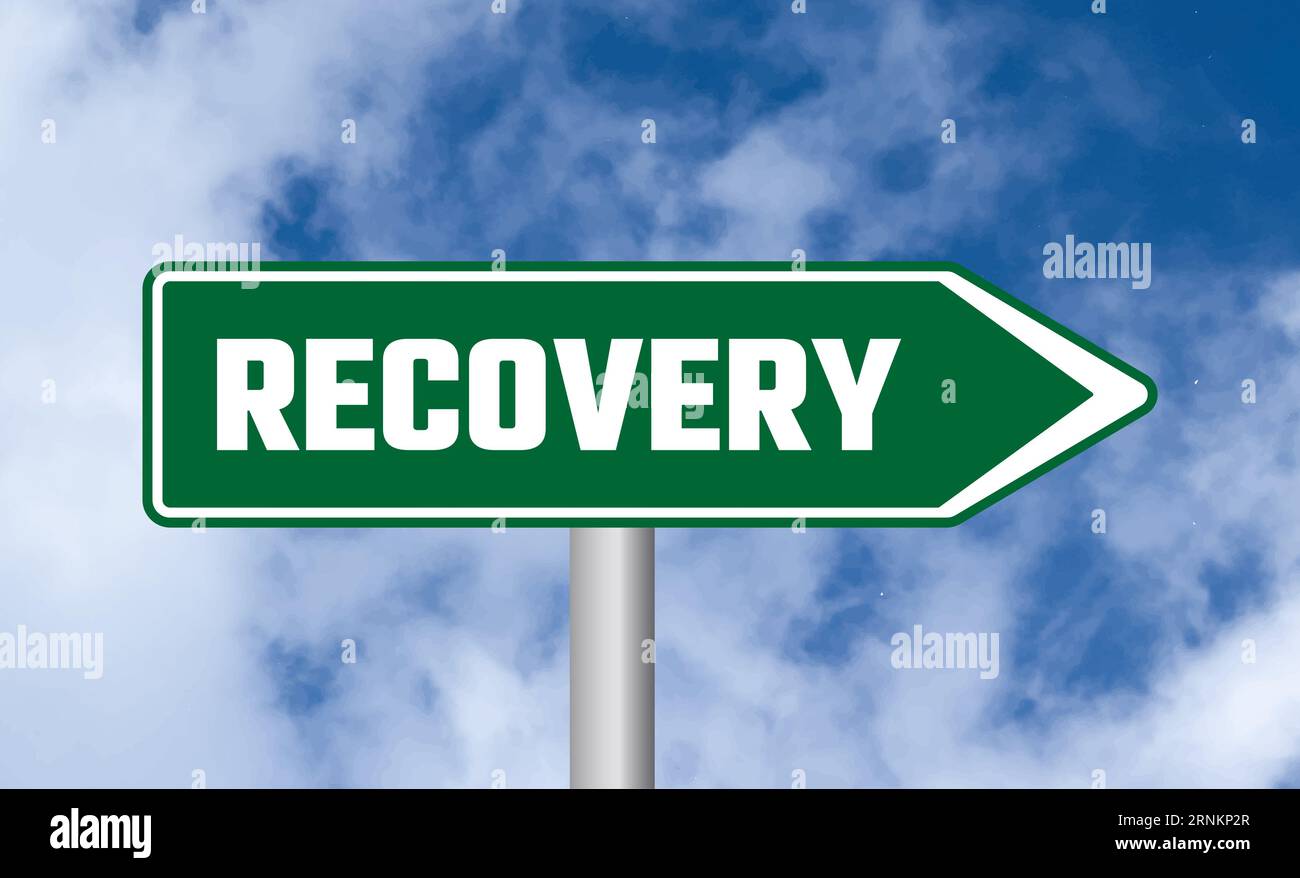 Recovery road sign on cloudy sky background Stock Photo - Alamy
