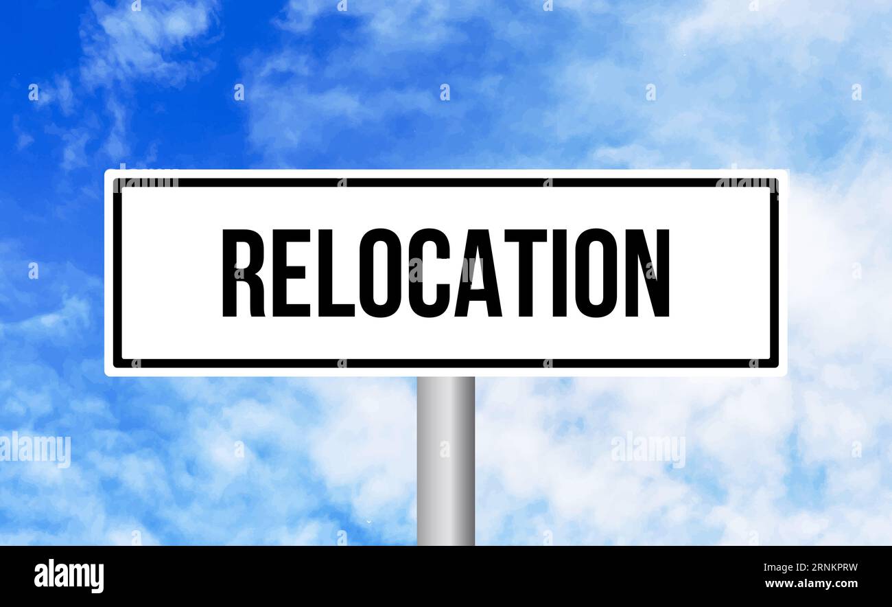 Relocation road sign on sky background Stock Photo - Alamy