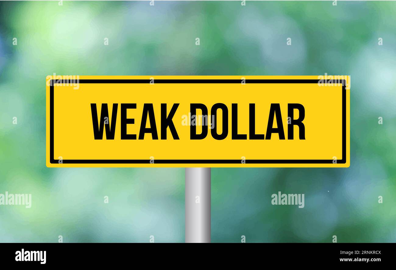 Weak dollar road sign on blur background Stock Photo - Alamy
