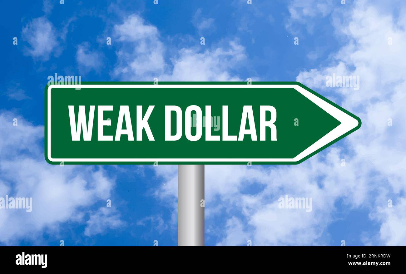 Weak dollar road sign on cloudy sky background Stock Photo - Alamy