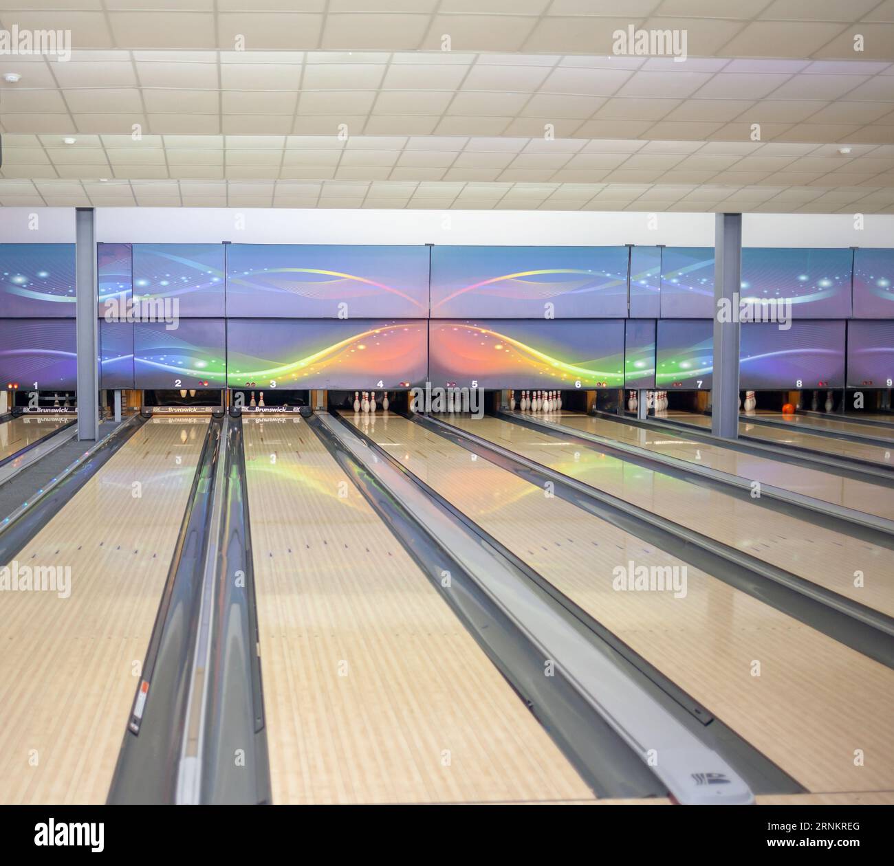 Paths with balls and pins for bowling. A fun game for the company Stock ...