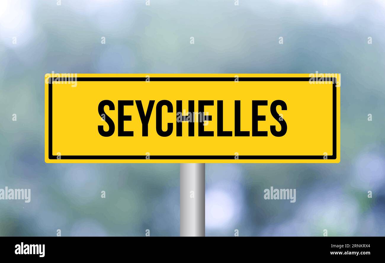 Seychelles road sign on blur background Stock Photo - Alamy