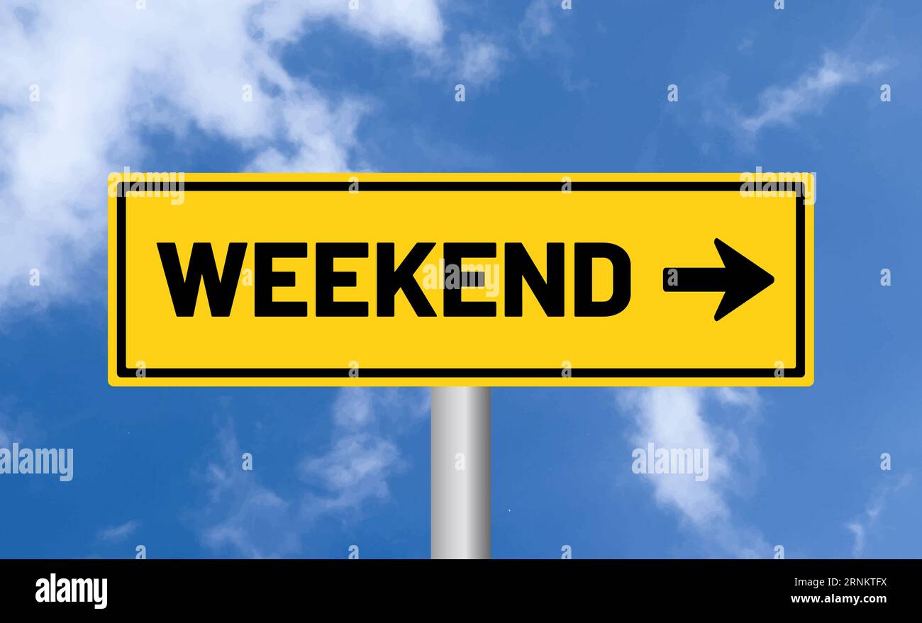 Weekend road sign on sky background Stock Photo - Alamy
