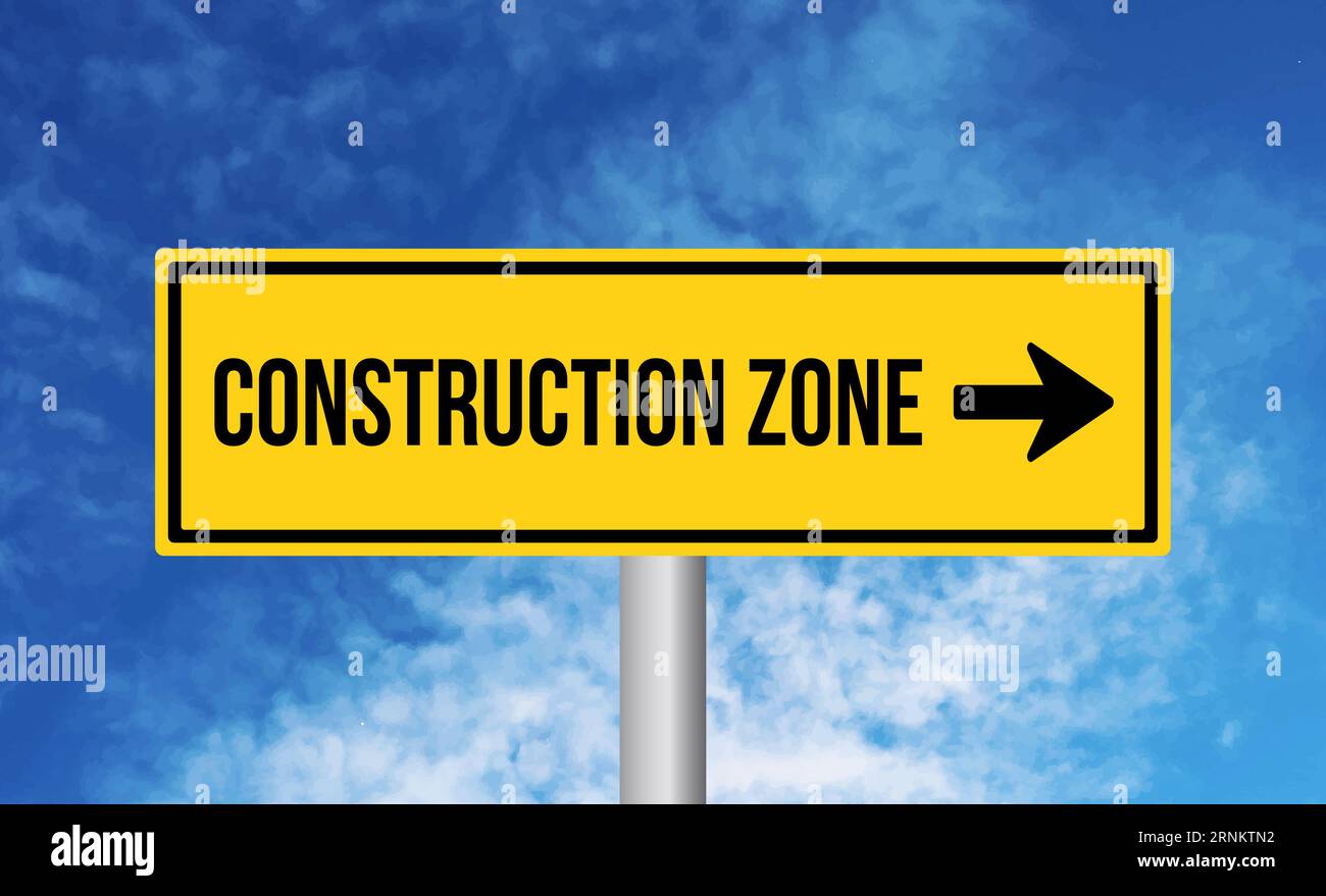 Construction zone road sign on sky background Stock Photo - Alamy