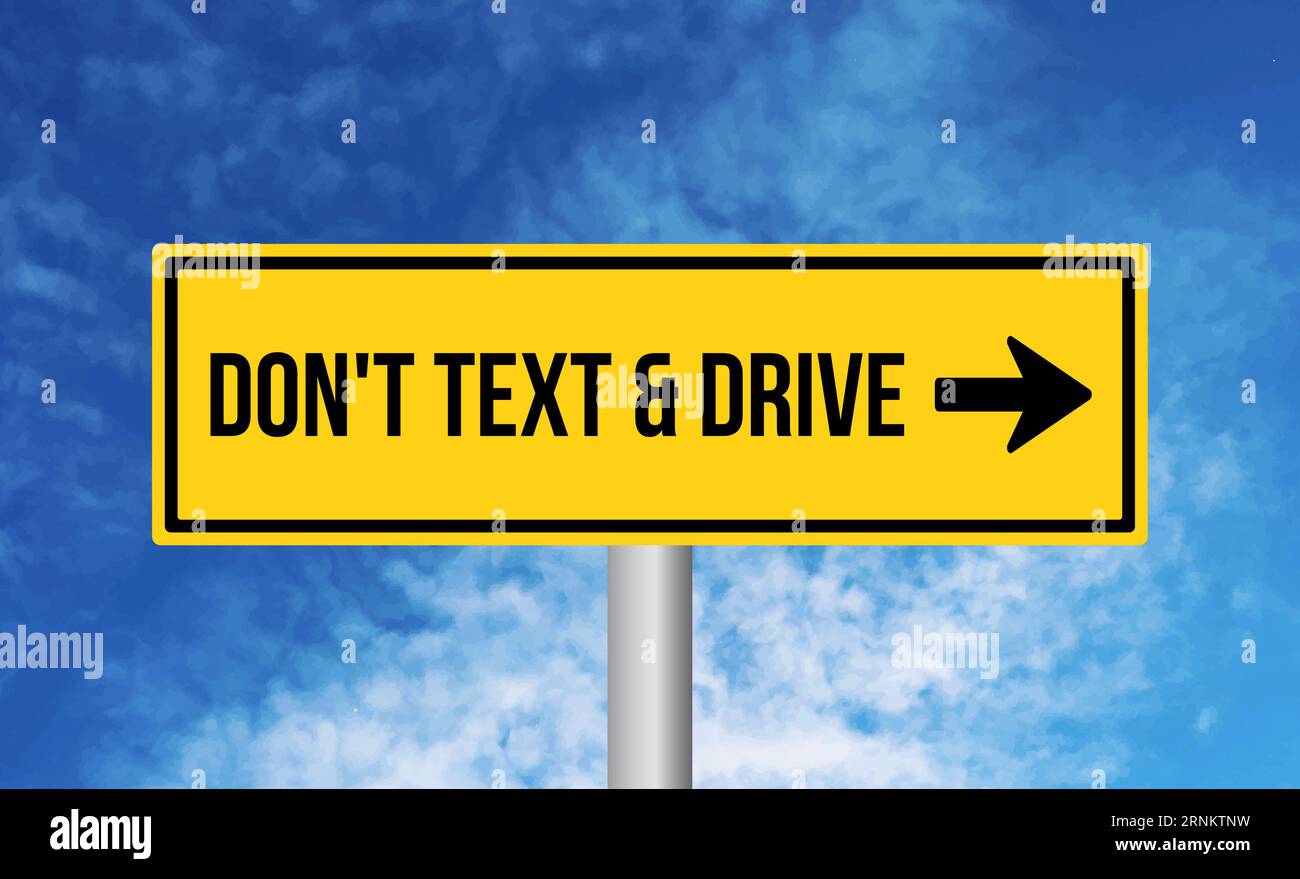 Dont text and drive road sign on cloudy sky background Stock Photo - Alamy