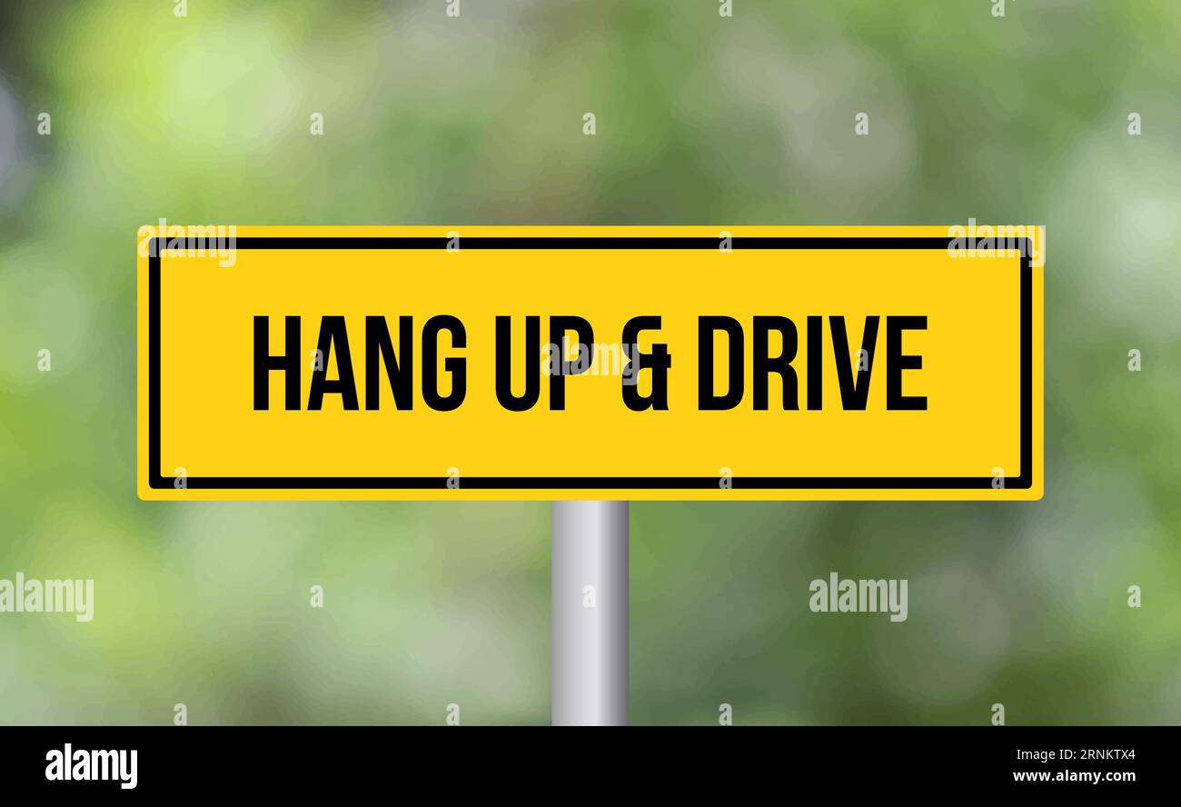 Hang up and drive road sign on blur background Stock Photo - Alamy