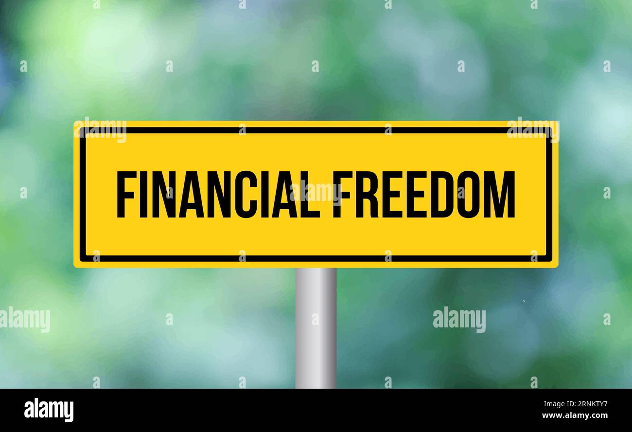 Financial freedom road sign on blur background Stock Photo - Alamy