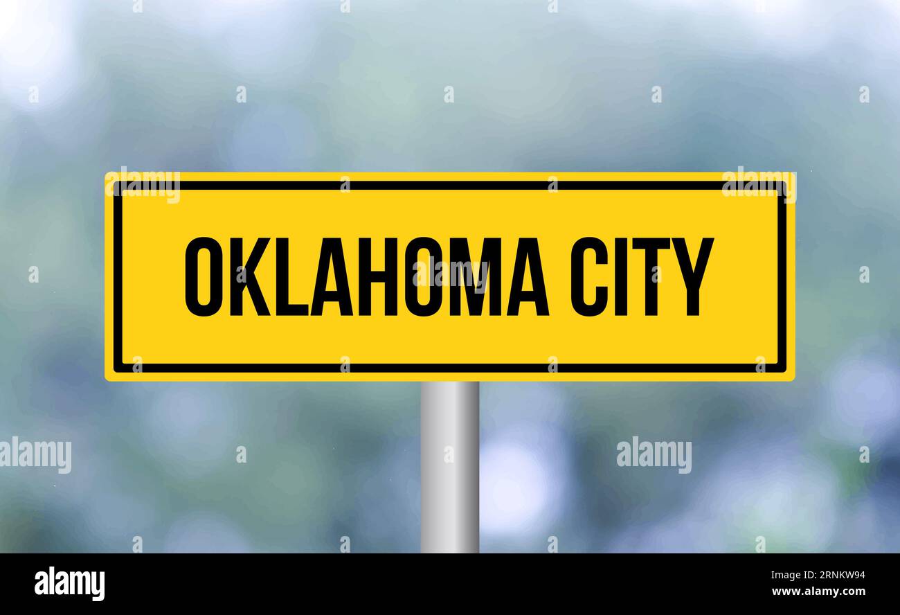 Oklahoma city road sign on blur background Stock Photo - Alamy