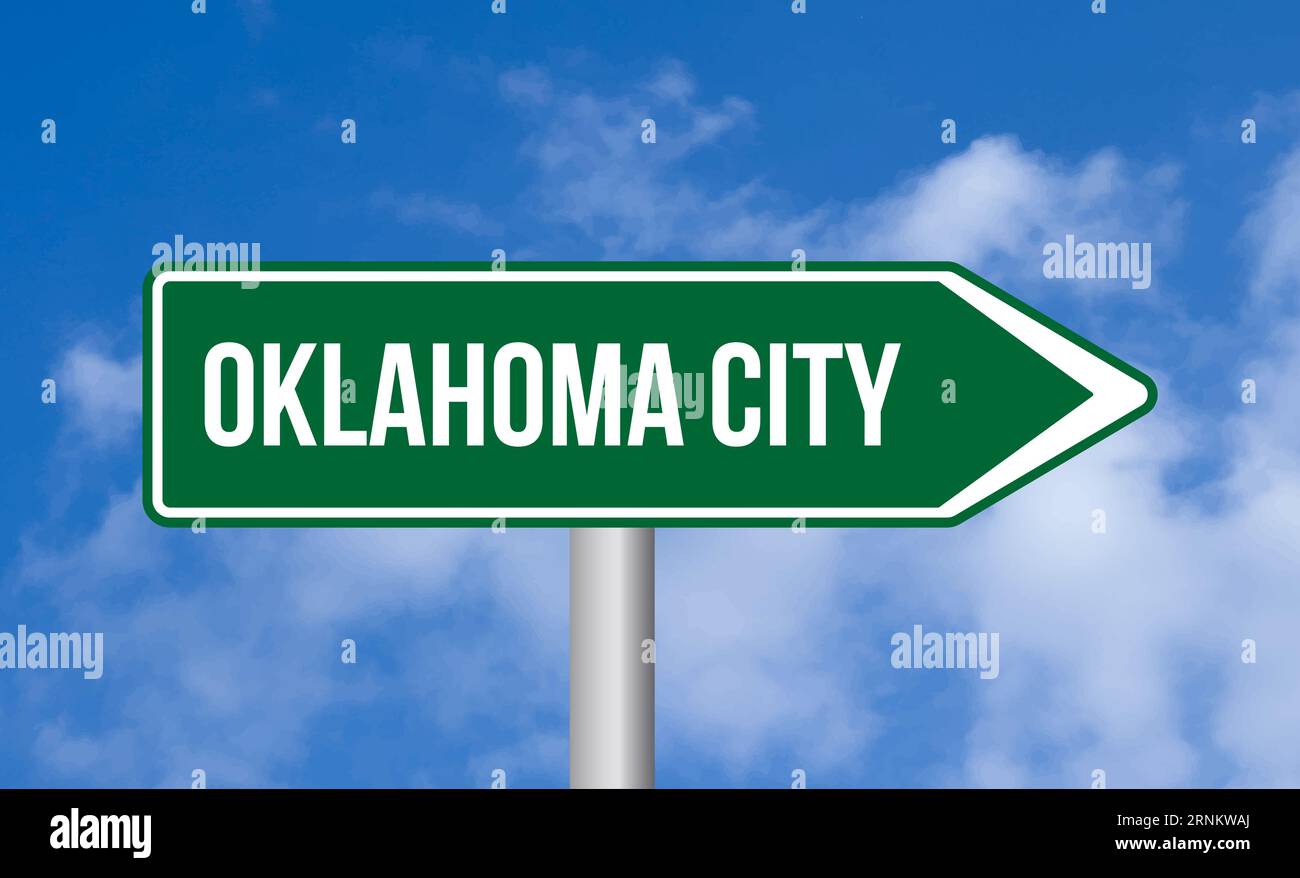 Oklahoma city road sign on sky background Stock Photo - Alamy