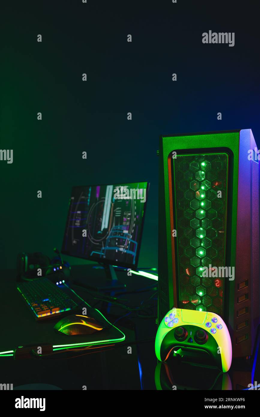 Vertical image of computer with video game accessories with copy space ...