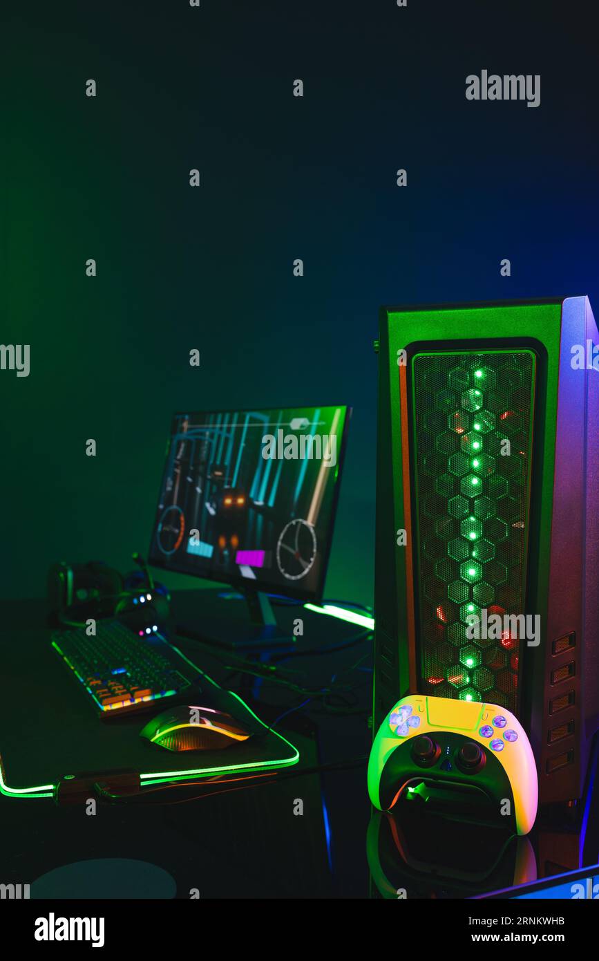 Vertical image of computer with video game accessories with copy space ...