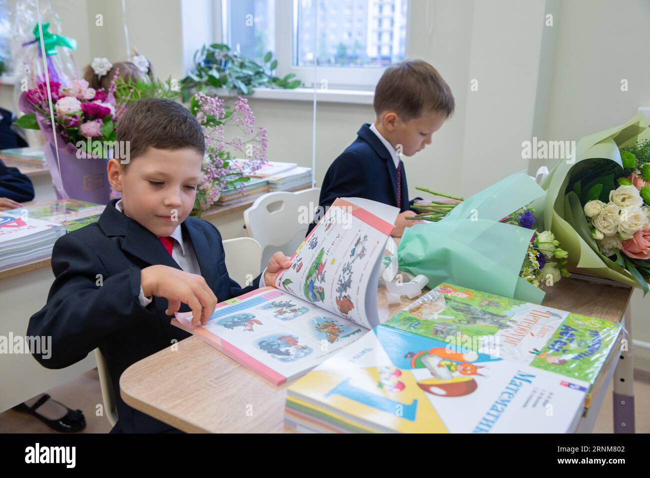 St. Petersburg, Russia. 1st Sep, 2023. First graders read textbooks in ...