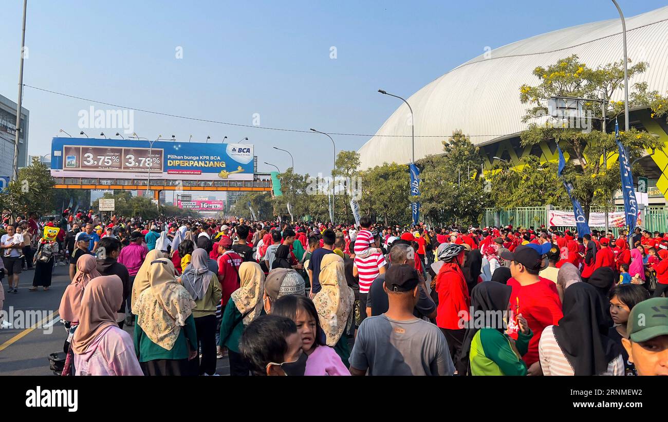 View of the A huge crowd attends the car free day along Ahmad Yani ...