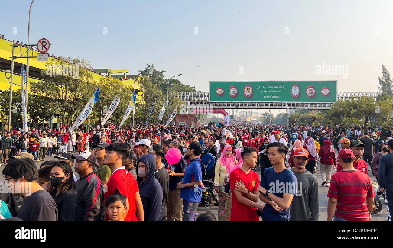 View of the A huge crowd attends the car free day along Ahmad Yani ...