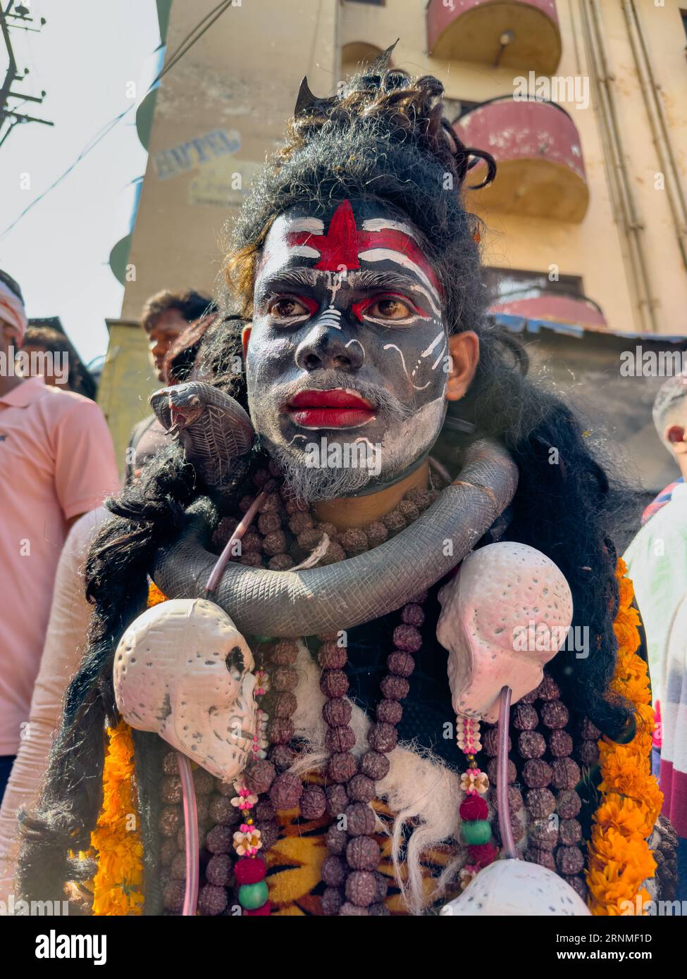 Masan Holi, Portrait of an male artist with painted face act as lord ...