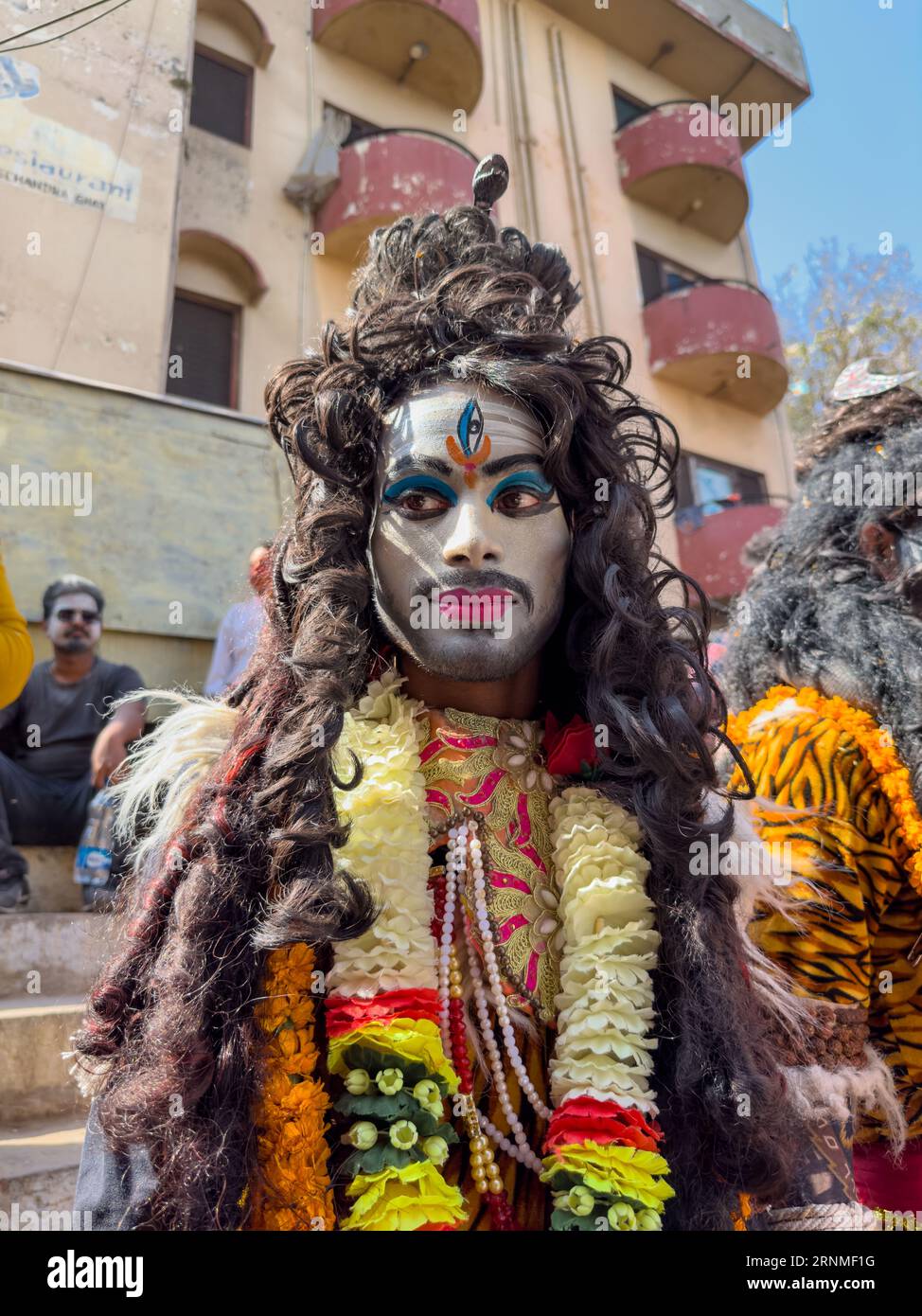 Masan Holi, Portrait of an male artist with painted face act as lord ...